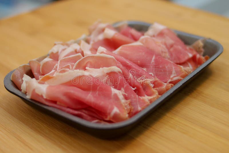 Sliced meat on the market stock image. Image of stack - 112088521