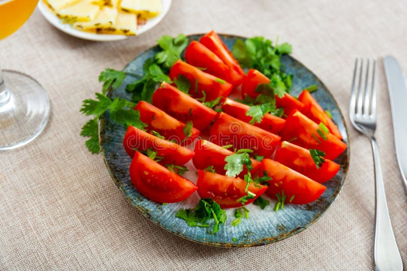 Fresh Sliced Tomatoes and Cilantro Nicely Served on Plate Stock Image ...