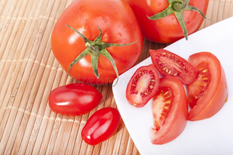 Fresh Sliced Tomatoes Served Stock Photo - Image of tasty, tomato ...