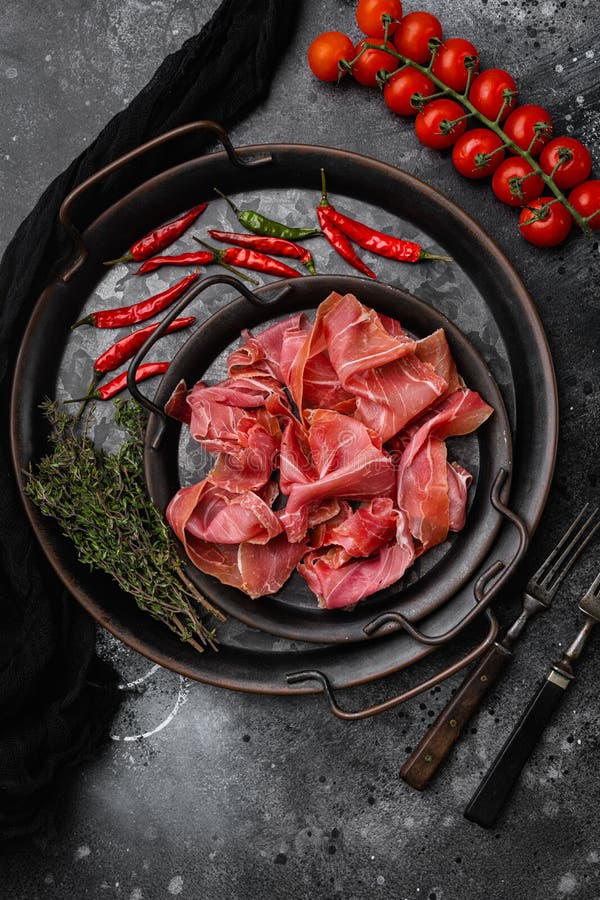 Fresh Slices Jamon Set, on Black Dark Stone Table Background, Top View ...