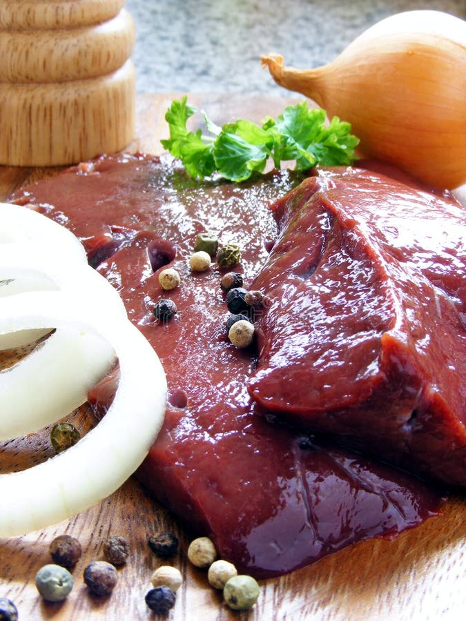 Raw Uncooked Meat Sliced in Cubes with Fresh Herbs, Vegetables and ...