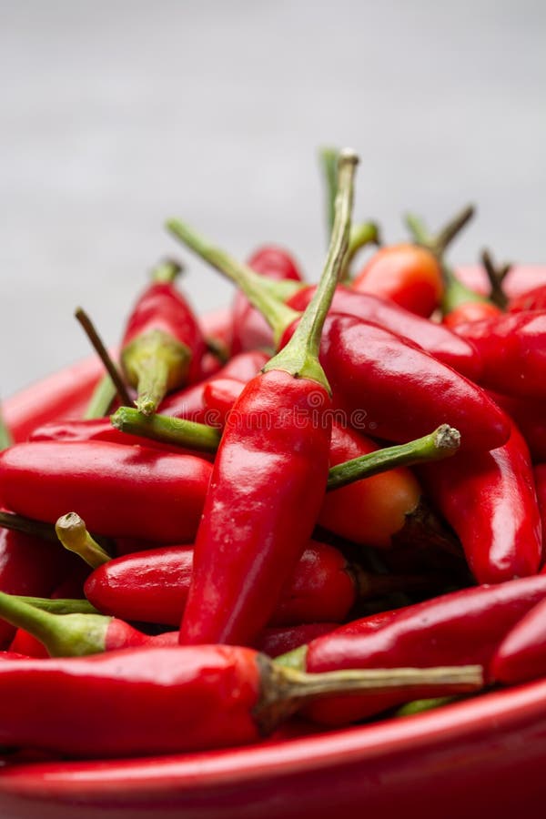 Fresh Small Red Hot Chili Peppers on Grey Background Stock Image ...
