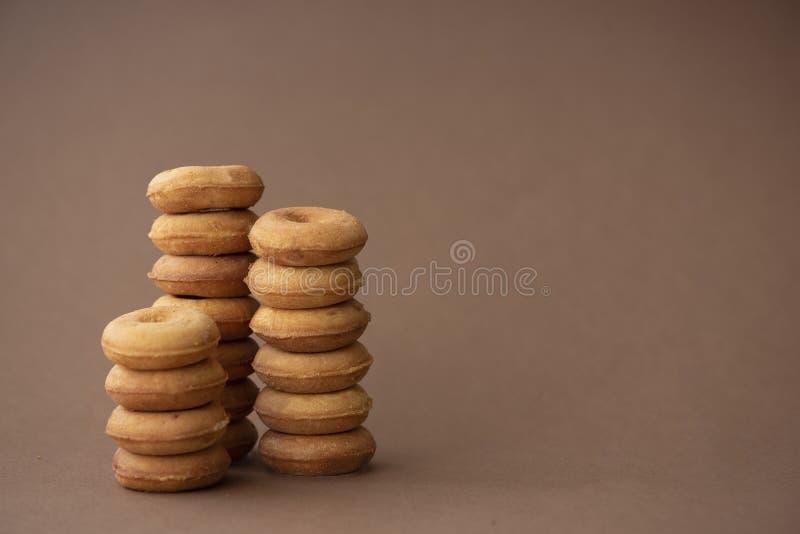 Round Donuts Covered with Powdered Sugar Lying in a Wicker Basket. they ...