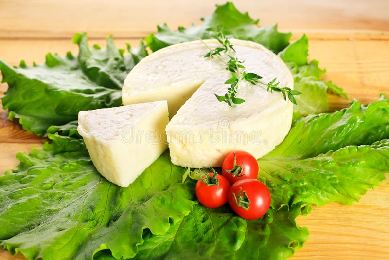 Fresh Solid Cream Cheese on Board with Fresh Herbs Stock Image - Image ...