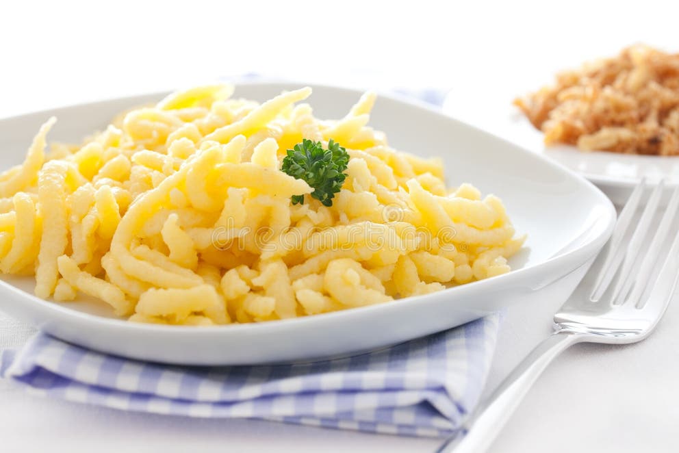 Fresh spaetzle on a plate stock photo. Image of side - 19166056