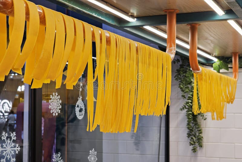 Fresh Spaghetti Hanging on Drying Rack. Stock Image - Image of cook ...