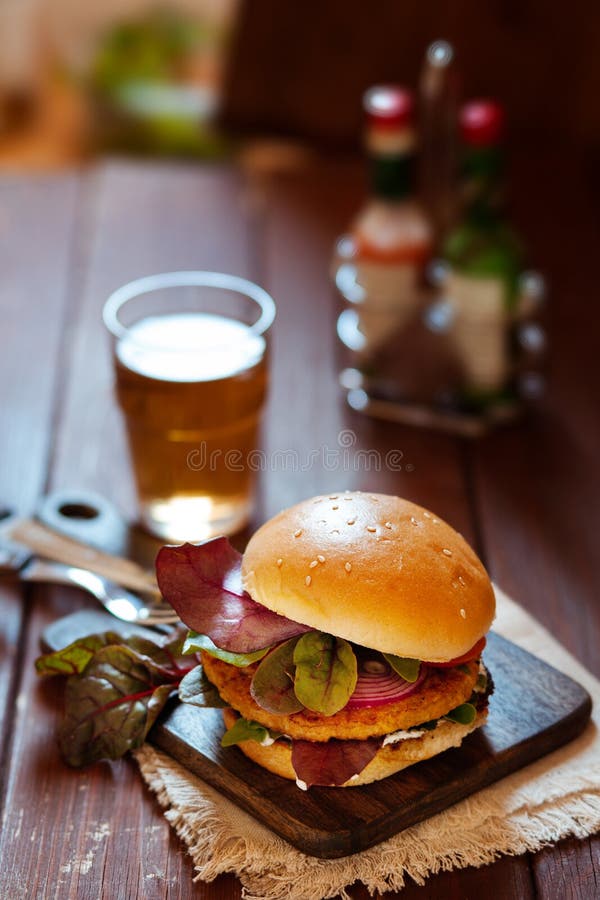 Fresh Spicy Grilled Kosher Hamburger on a Rustic Wooden Table Stock ...