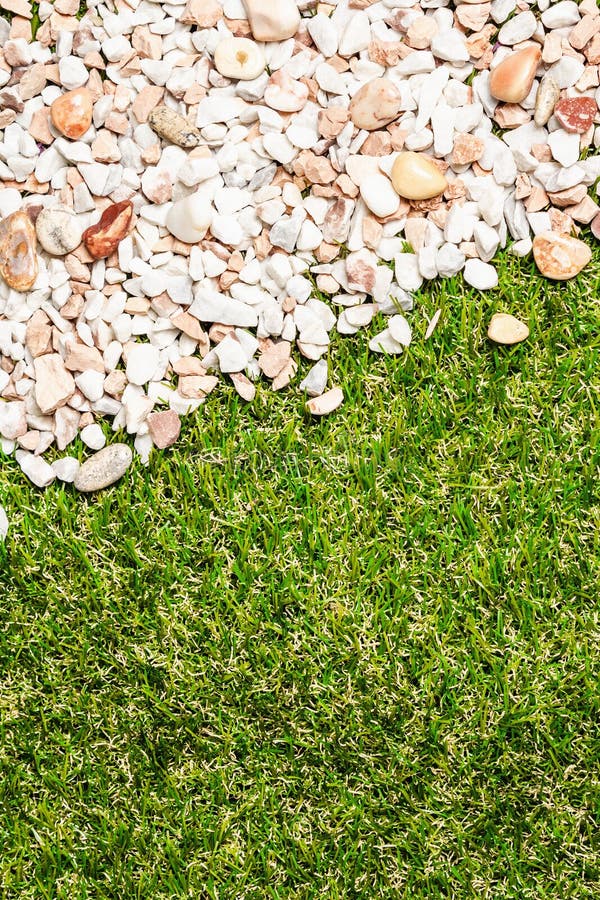 Fresh Spring Background with Scattered Decorative Pebbles on Green ...