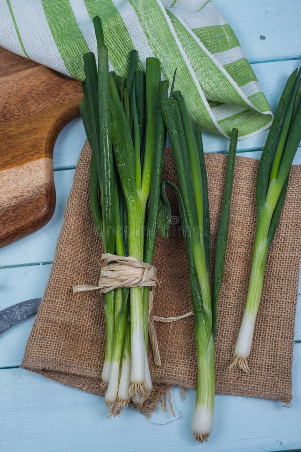 Fresh Spring Onion Bunch on Wooden Table Stock Image - Image of food ...
