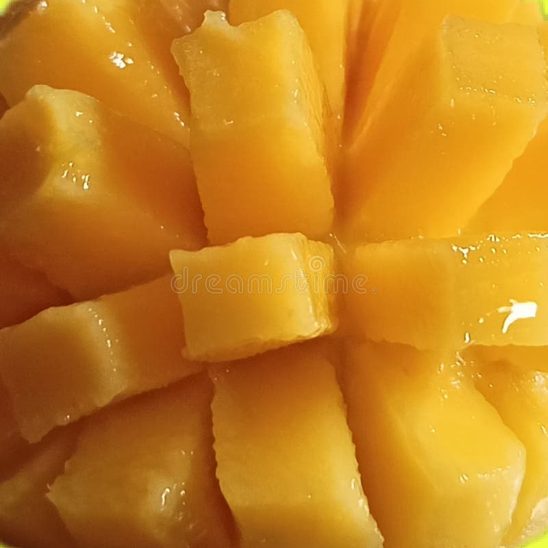 A Square Mango Slice Isolated from a Black Background, Perfect for ...