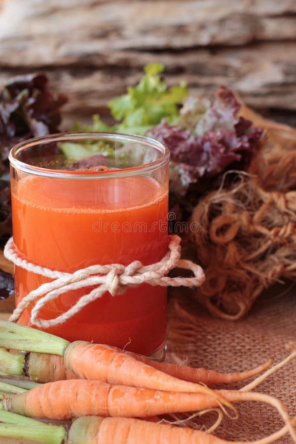 Fresh Squeezed Carrot Juice and Fresh Carrots. Stock Photo - Image of ...