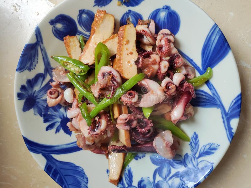 Fresh Squid Scrambled with Pepper and Bean Curd in the Blue Plate Stock ...