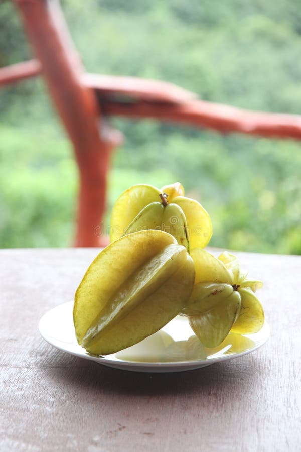 Fresh star fruit in dish. stock photo. Image of food - 42509868