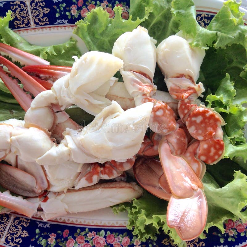 Fresh steamed crabs legs stock photo. Image of serving - 64264464