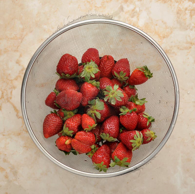 Red Strawberries in Colander on a White Wooden Table Stock Image ...