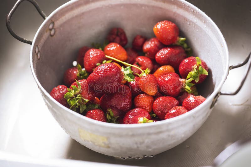 Red Strawberries in Colander on a White Wooden Table Stock Image ...