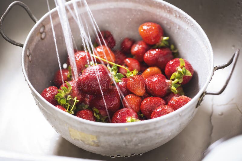 Red Strawberries in Colander on a White Wooden Table Stock Image ...
