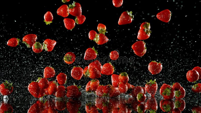Fresh Strawberries Falling Down on Black Background Stock Image - Image ...