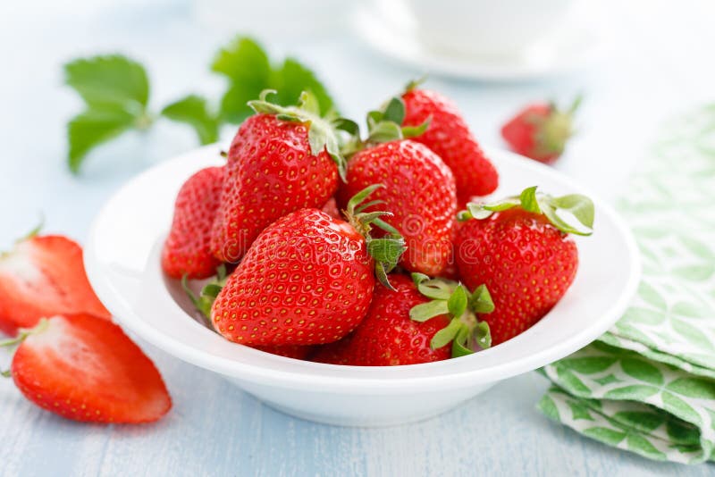 Fresh Strawberry with Leaves in Bowl on Table Stock Photo - Image of ...