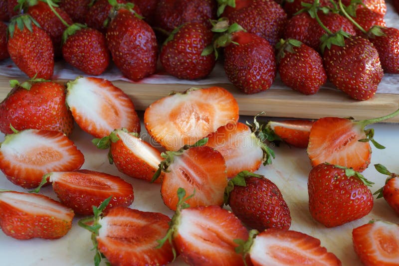 Fresh Strawberry Cut on a Chopping Board Stock Image - Image of ...