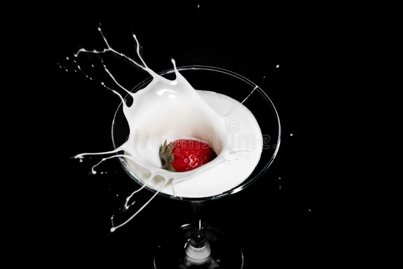 Fresh Strawberry Falling into Glass of Milk Stock Image - Image of ...