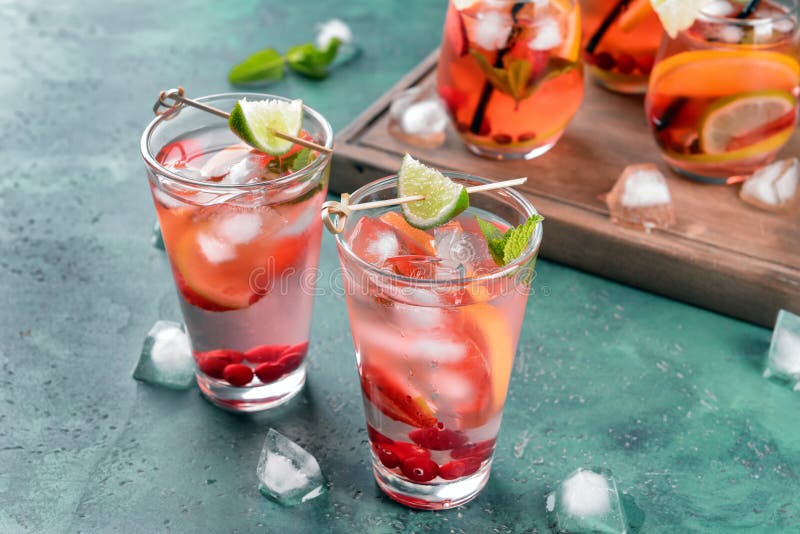 Fresh Summer Cocktail in Glasses on Color Table Stock Image - Image of ...