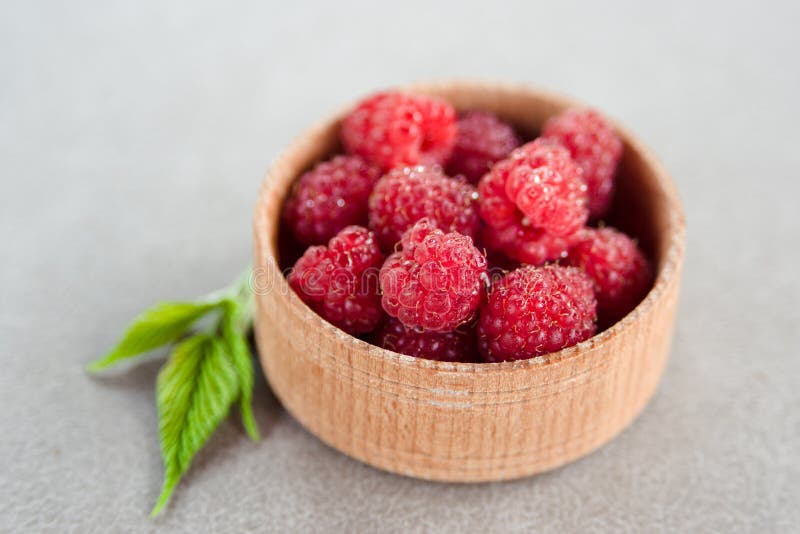 Fresh Summer Raspberry in a Wooden Bowl. Selective Focus. Stock Photo ...