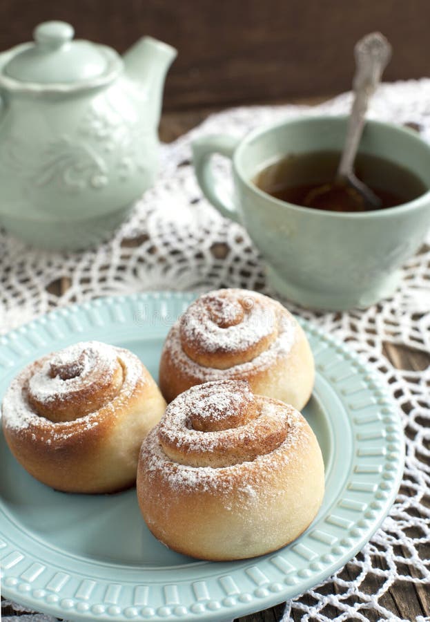 Fresh Sweet Homemade Cinnamon Rolls and Cup of Tea Stock Photo - Image ...