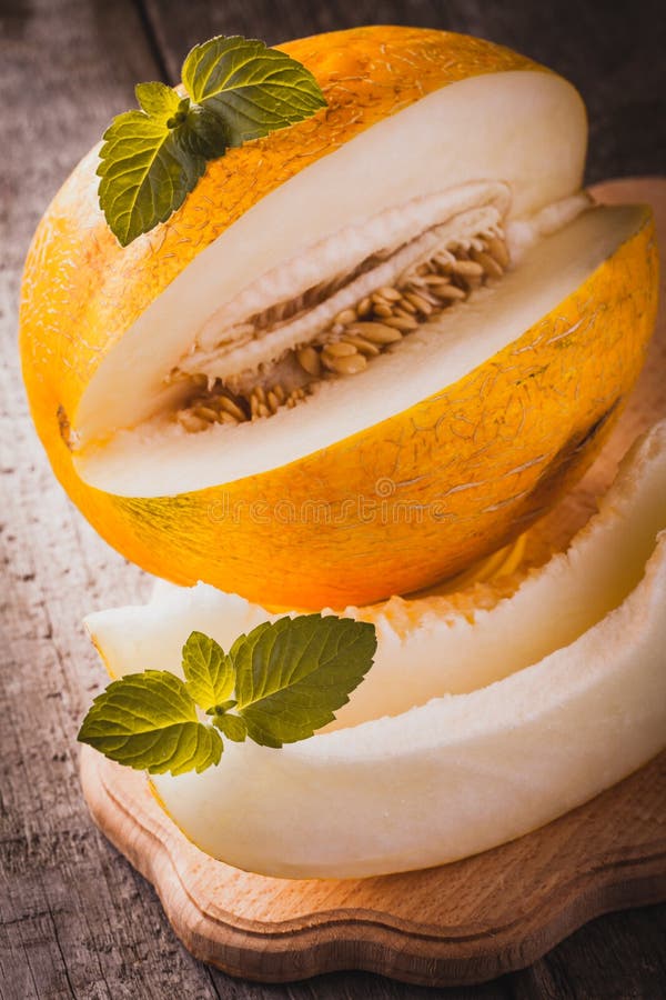 Fresh Sweet Orange Melon on the Wooden Table Stock Image - Image of ...