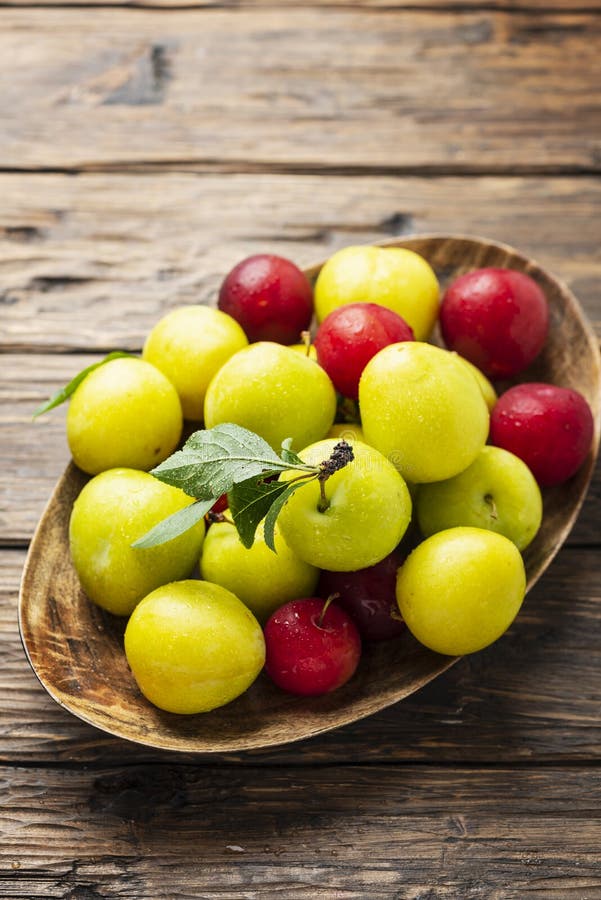 Fresh Sweet Plums on the Wooden Table Stock Photo - Image of sweet ...