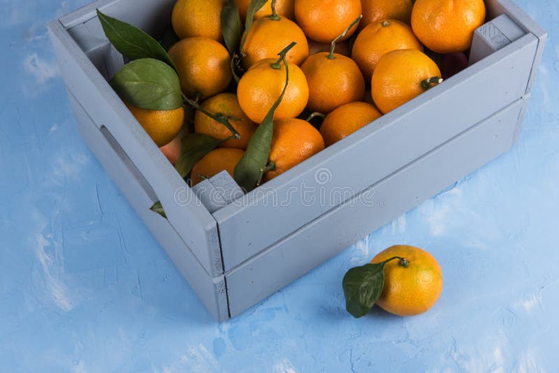 Fresh Tangerines in Box with Leaves Stock Photo - Image of background ...