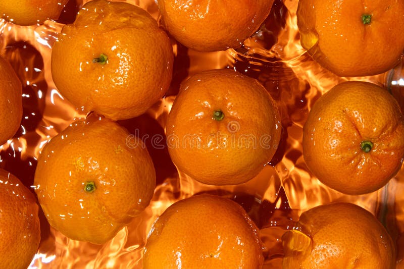 Fresh Tangerines Splashing into Clear Water Top View Stock Photo ...