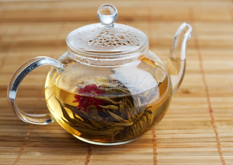 Fresh tea in glass teapot stock image. Image of drop - 18709653
