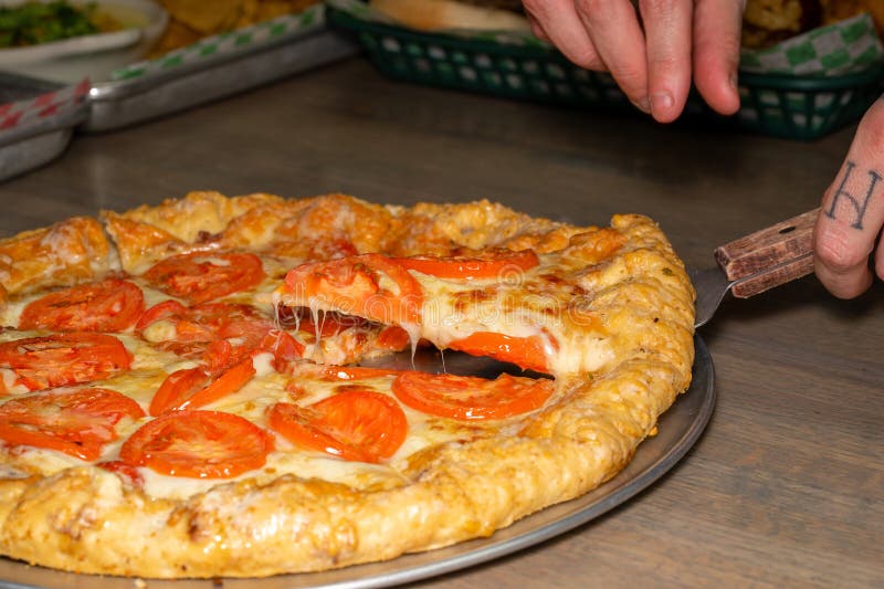 Fresh Thick Deep Dish Crust Cheese Pizza with Big Bright Red Tomatoes ...