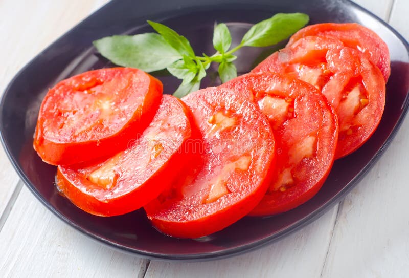 Fresh tomato stock photo. Image of four, basil, nutrition - 27549076