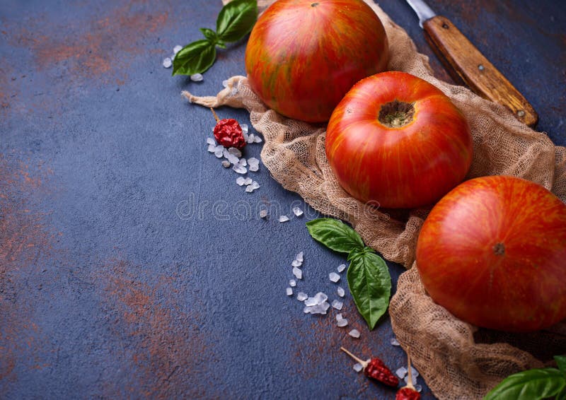 Fresh Tomato on Blue Rusty Background. Stock Photo - Image of plant ...