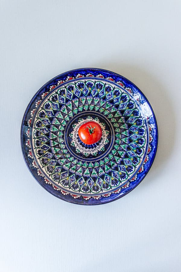 Fresh Tomato on Traditional Oriental Ceramic Plate Stock Photo - Image ...