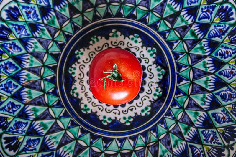 Fresh Tomato on Traditional Oriental Ceramic Plate Stock Photo - Image ...