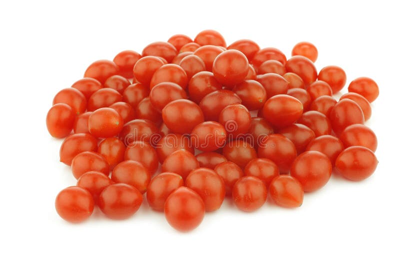 Small tomatoes in a basket stock photo. Image of vegetables - 26469732