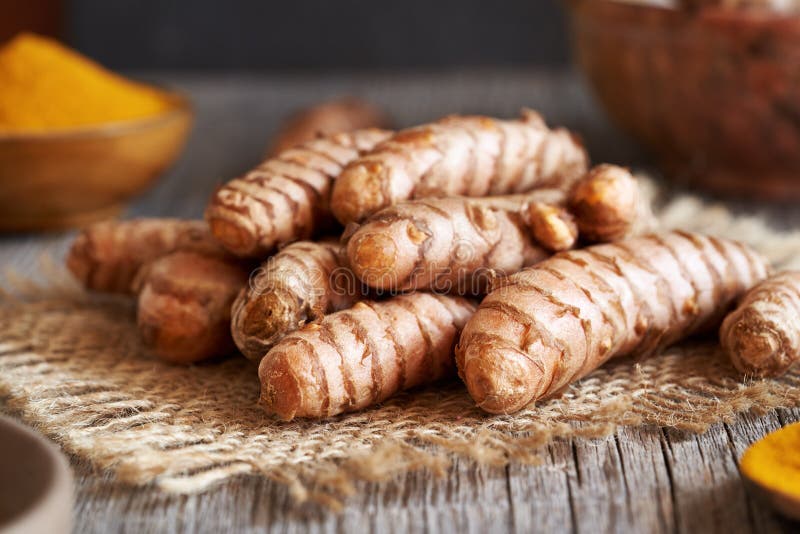 Fresh Turmeric Root on a Table, Close Up Stock Image - Image of table ...