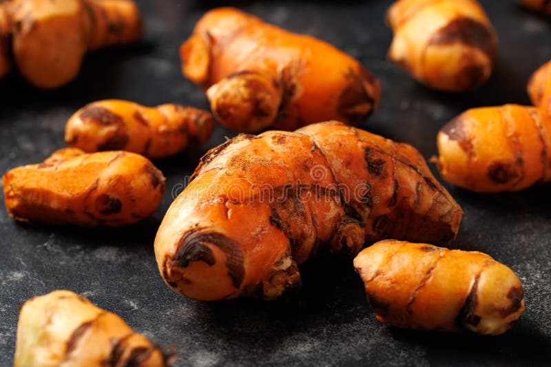 Fresh Turmeric Roots in a Rustic Table Stock Photo - Image of natural ...