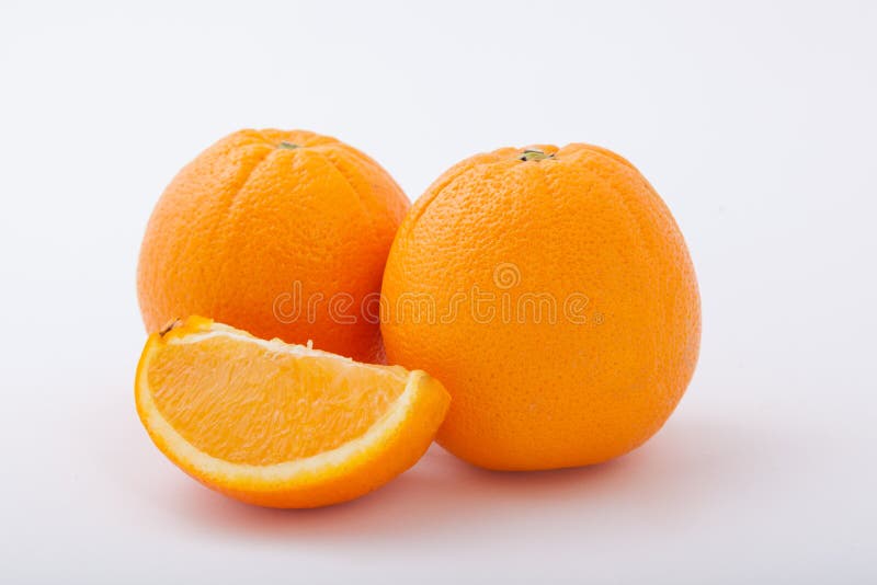 Fresh Two Whole Orange Fruit and One Segment Stock Photo - Image of ...