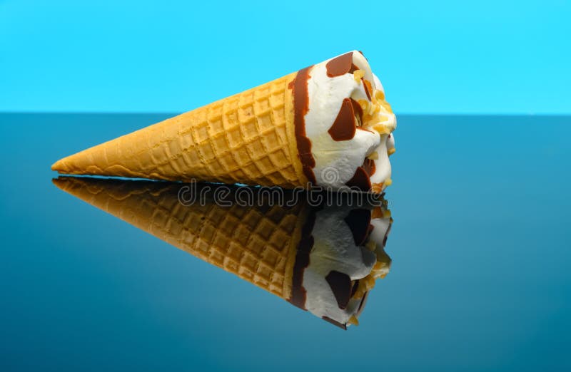 A Fresh Vanilla Flavor Ice Cream Cone on a Glass with Reflection Stock ... A Fresh Vanilla Flavor Ice Cream Cone on a Glass with Reflection Stock ...