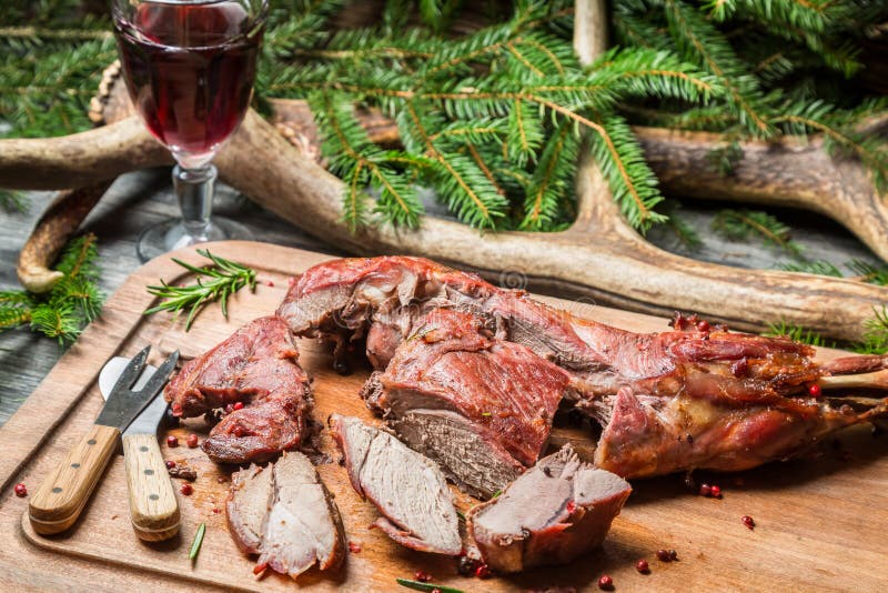 Fresh Venison Around with Antlers and Spruce Stock Image - Image of ...
