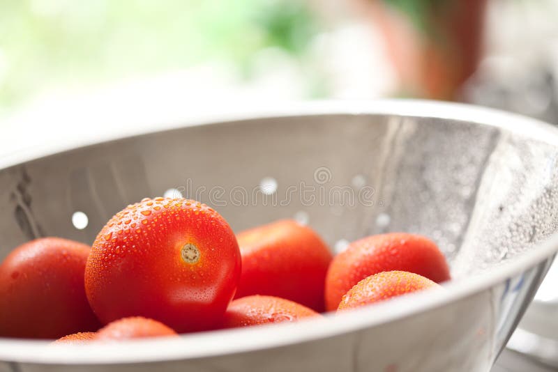 Fresh, Vibrant Roma Tomatoes in Colander with Wate Stock Image - Image ...