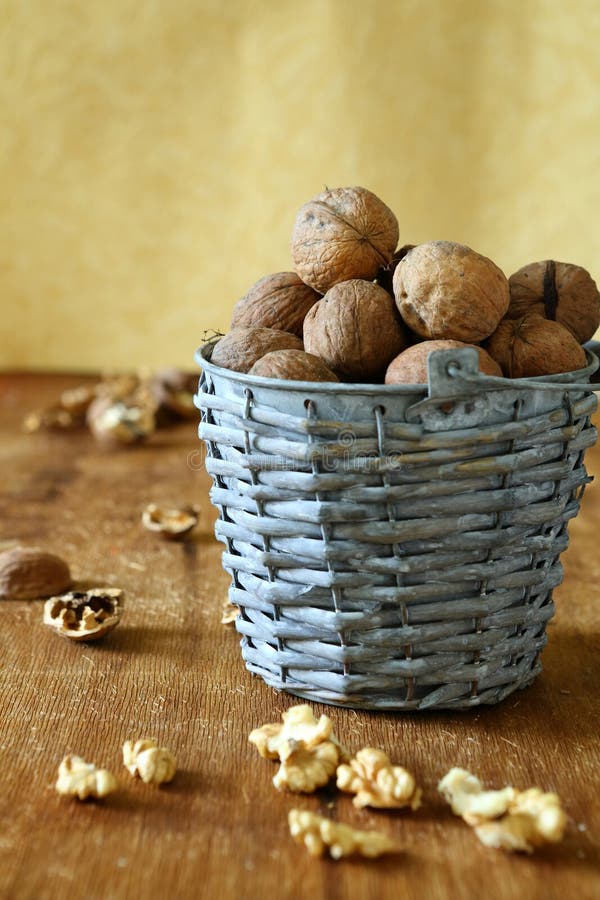 Fresh Walnuts in a Bucket and Shells Stock Image - Image of wooden ...