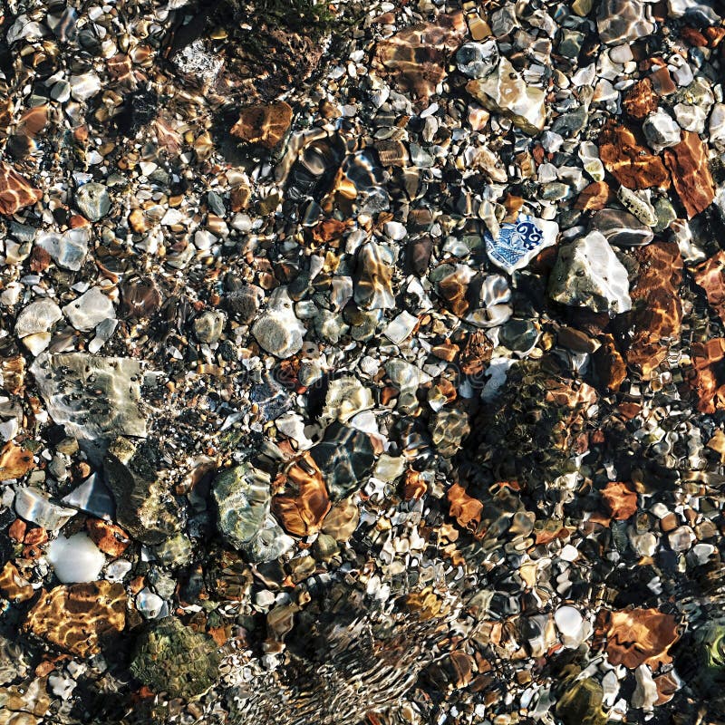 Fresh Water Flowing Over Pebbles Stock Photo - Image of abstract, water ...