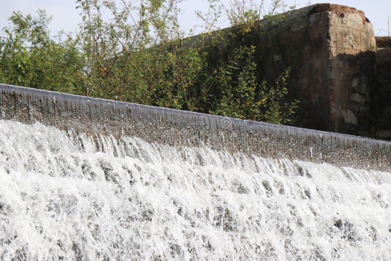 Fresh Water Flows through Steps Made of Brick on a Overflow Dam on a ...