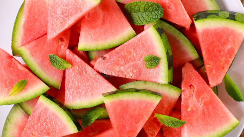 Watermelon sliced in half stock photo. Image of delicious - 124073850