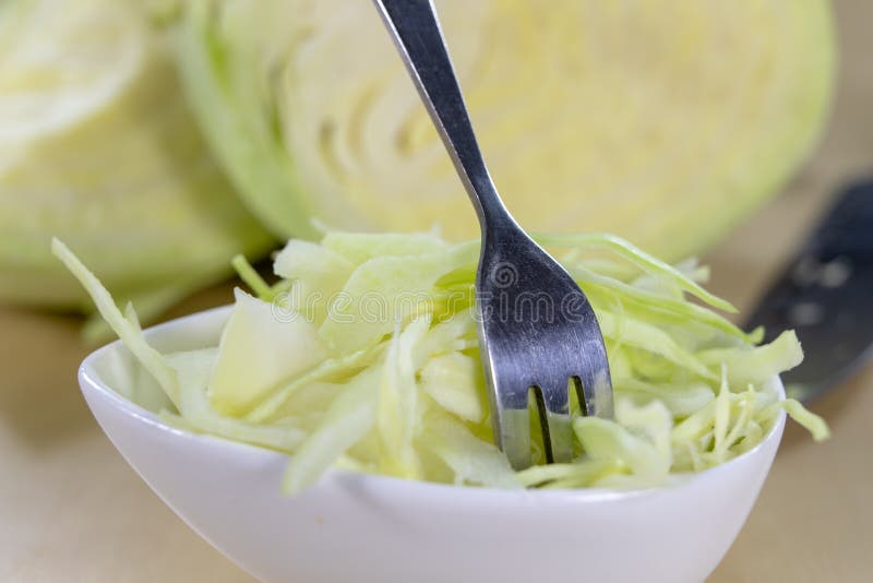 Fresh White Cabbage Cut into Strips on the Kitchen Table. Vegetables ...
